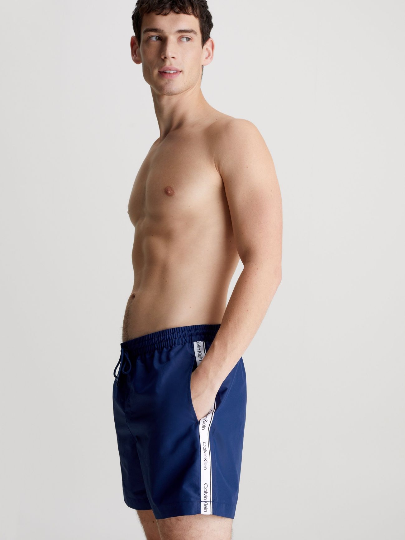Calvin Klein Mens Signature Navy Core Logo Tape Swim Short | Designerwear